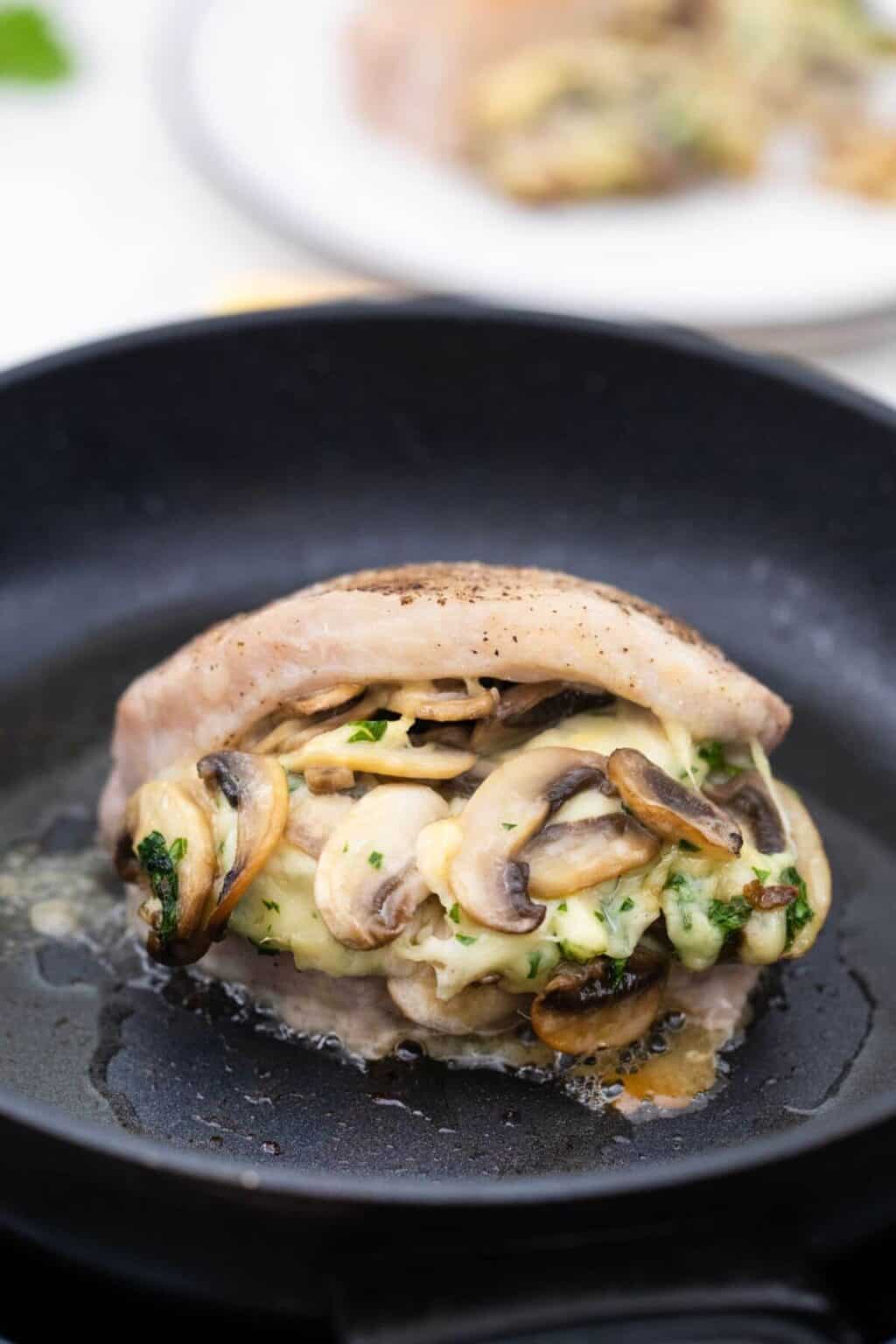 Baked Stuffed Pork Chops with Mushrooms and Cheese | Little Bit Recipes