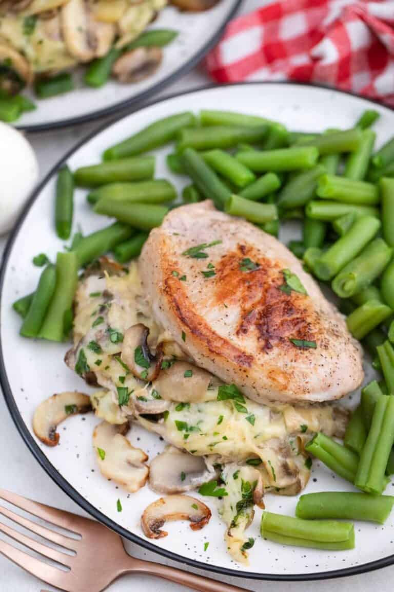 Baked Stuffed Pork Chops with Mushrooms and Cheese | Little Bit Recipes